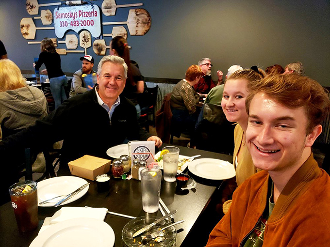 Happy faces around the table tell the real story. Nothing brings people together quite like Samosky's legendary pies.