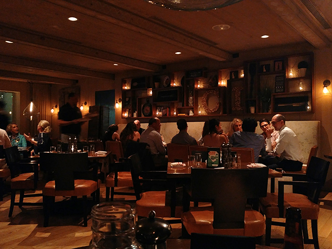 The evening ambiance transforms dinner into an event – like your taste buds got tickets to the hottest show in town.