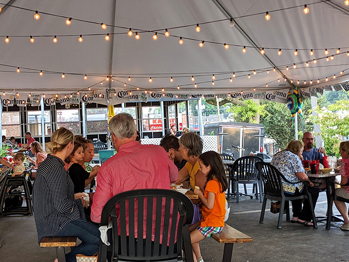 Under twinkling lights, strangers become neighbors and neighbors become friends&mdash;the outdoor dining magic of Pinocchio's in action.