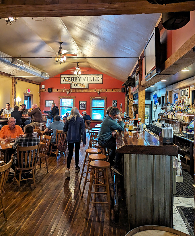 Local diners gather around tables, creating the kind of community atmosphere that makes every meal feel special.