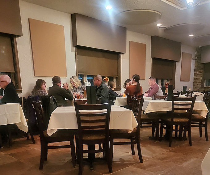 Where memories are made between bites. Notice how nobody's looking at their phones&mdash;the food commands complete attention.