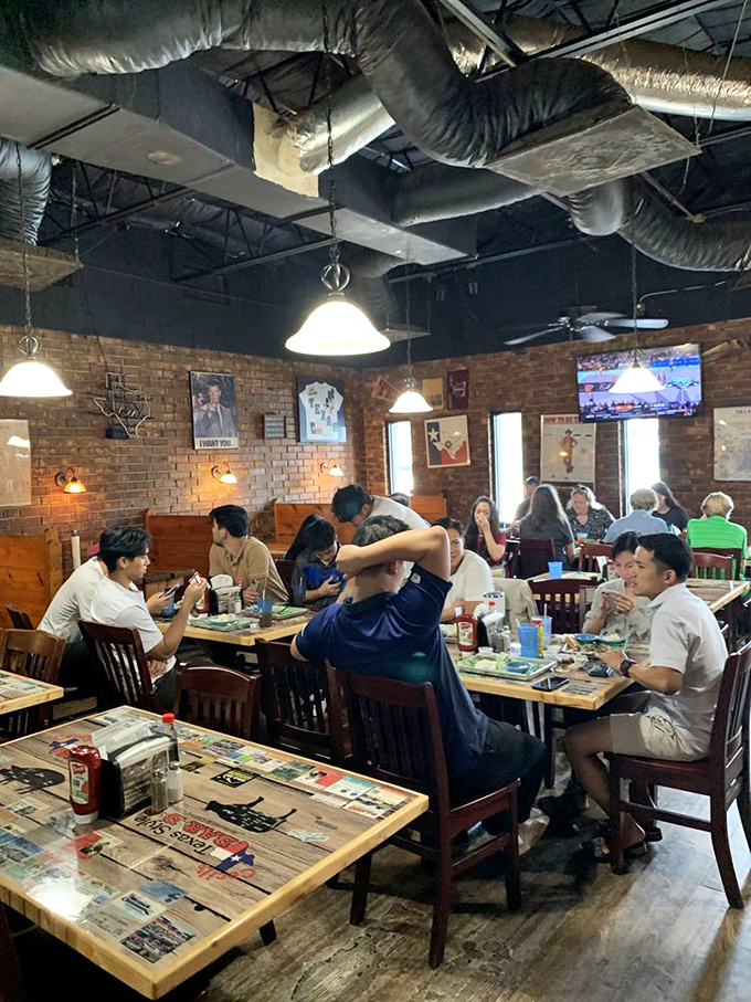 Families and friends gathered around tables, creating memories one bite at a time&mdash;the universal language of barbecue in action.