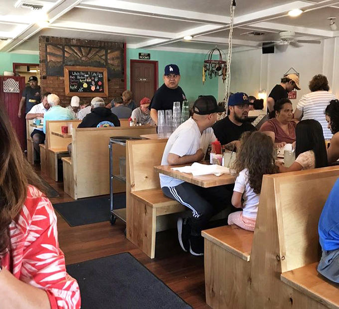 Where strangers become friends over shared appreciation of pancake stacks. Notice how nobody's looking at their phones? That's the power of exceptional food.
