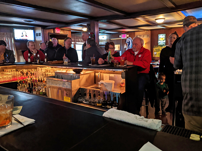 Friday night at the bar isn't just about waiting for a table &ndash; it's a pre-dinner social club where the conversation flows as freely as the brandy.