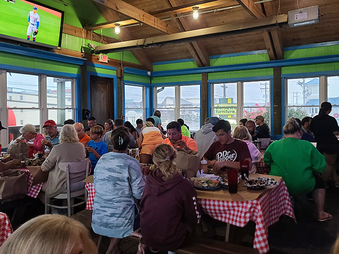 Where strangers become temporary friends united by the shared experience of seafood bliss. Nothing builds community quite like everyone looking equally ridiculous in a bib.