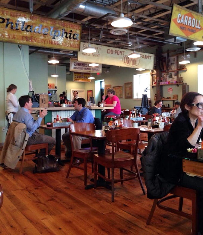 Vintage signs overhead tell Philadelphia's story while diners below create their own &ndash; conversations flowing as freely as the coffee refills.