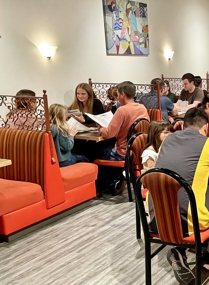 Happy diners discovering why this unassuming spot has such a devoted local following.