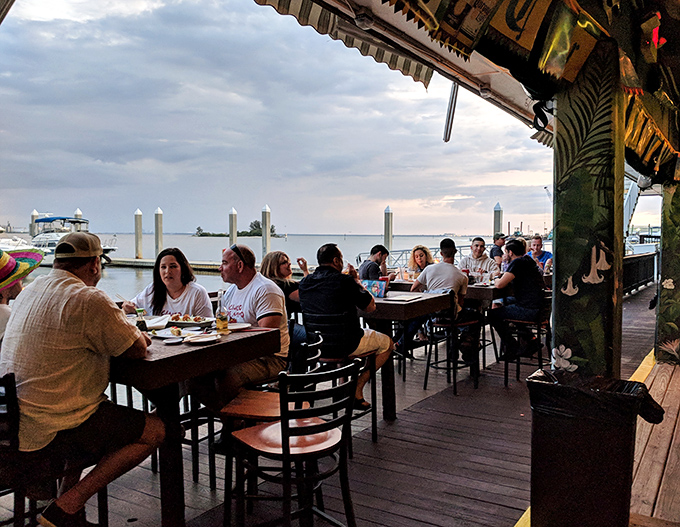The outdoor deck at sunset is where memories are made&mdash;and where locals bring out-of-town guests to inspire serious Florida envy.