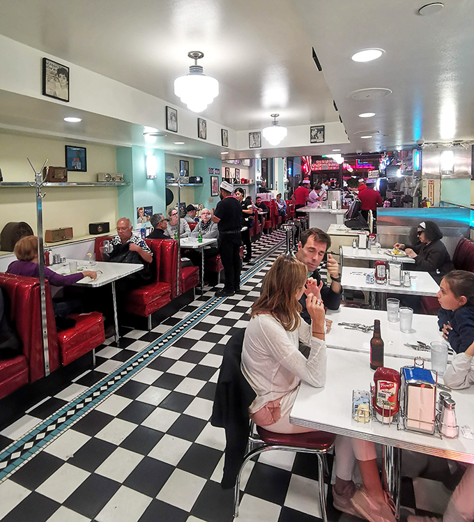 Real people enjoying real food in a space that celebrates the simple joy of sharing meals.
