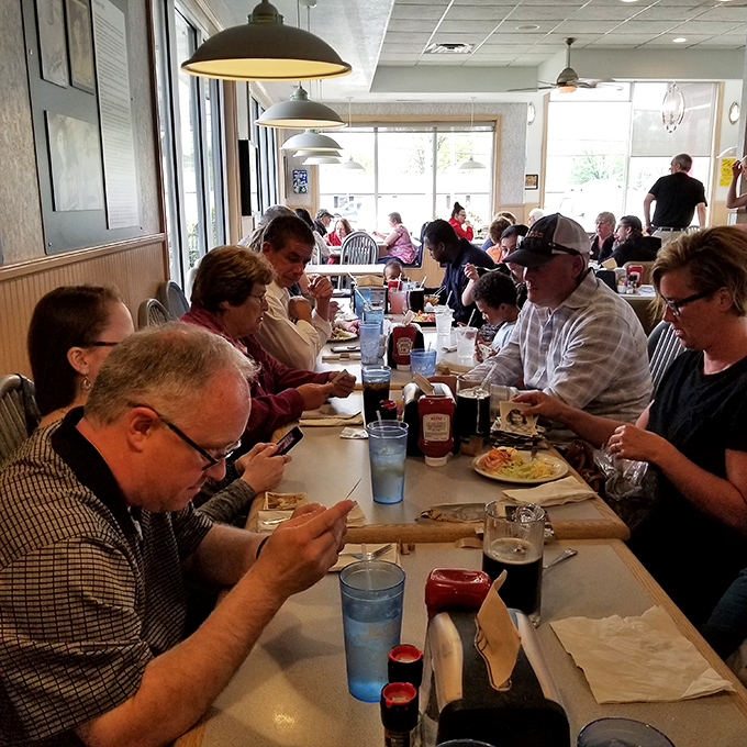 The true measure of a great restaurant: tables filled with people too busy enjoying their food to notice they're being photographed.