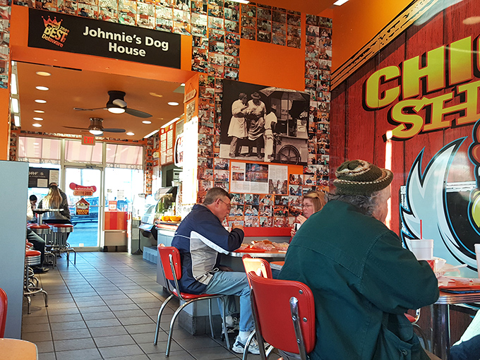 Where strangers become friends over shared appreciation of perfectly fried chicken. Notice nobody's checking their phones&mdash;food this good demands attention.
