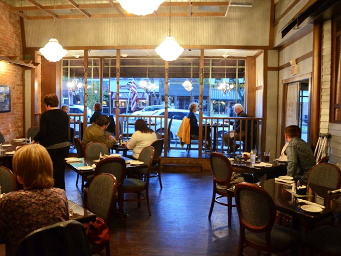 Happy diners in their natural habitat, probably discussing whether to get another order for the table.