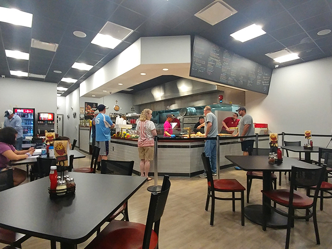 The ordering counter where dreams come true and diets go to die, with friendly faces ready to enable your pizza fantasies.