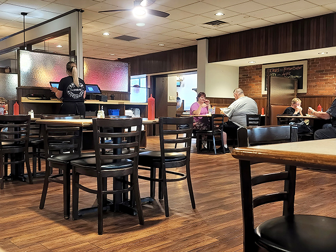 The dining room hums with the energy of satisfied customers—some discussing their meals, others simply enjoying the comfortable silence of contentment.