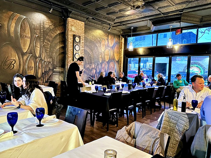 The wine barrel mural transforms an ordinary meal into a Tuscan escape. Even the blue water glasses seem to whisper, "Slow down, savor this moment." 