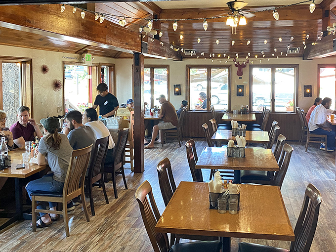 String lights overhead, wooden beams below, and in between, the happy murmur of people discovering their new favorite mountain eatery.