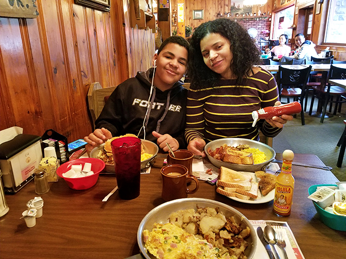 The restaurant brings families together over plates piled high with farm-fresh goodness. These smiles say it all!
