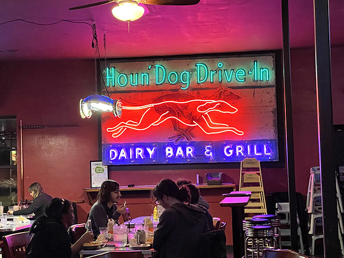 That neon glow says everything you need to know. Vintage signs illuminate conversations and create the perfect backdrop for memory-making.