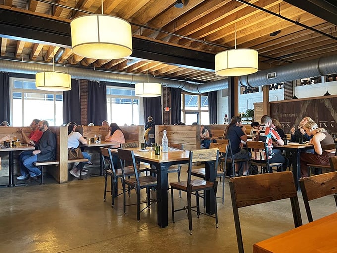 Where strangers become neighbors over shared meals and the warm glow of pendant lights softens even the hardest day.