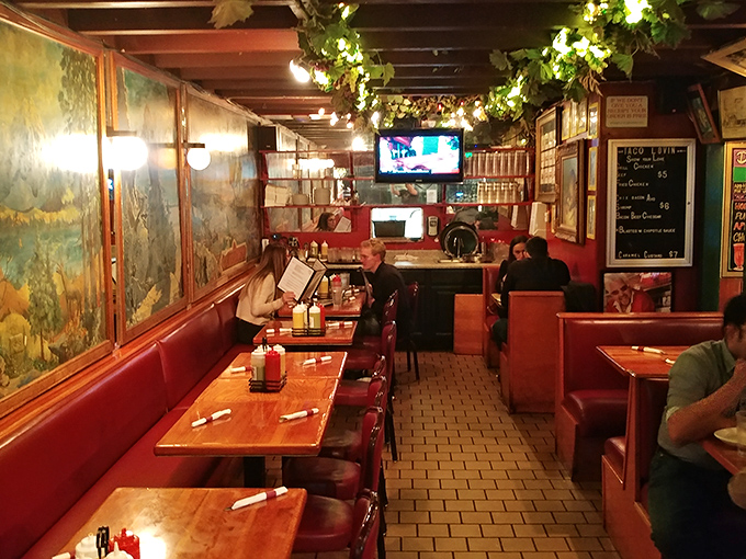 Where strangers become temporary family&mdash;this cozy dining space with its murals and hanging vines feels like eating in your eccentric aunt's living room.