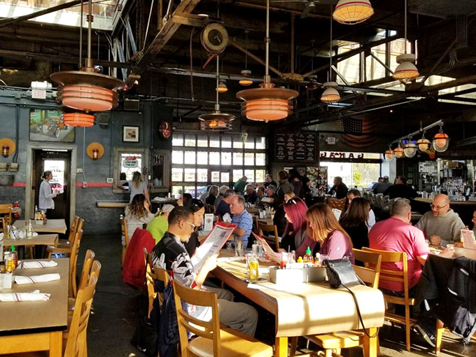 Where strangers become friends over shared food obsessions. The bustling dining room hums with the energy of satisfied customers plotting their next visit.