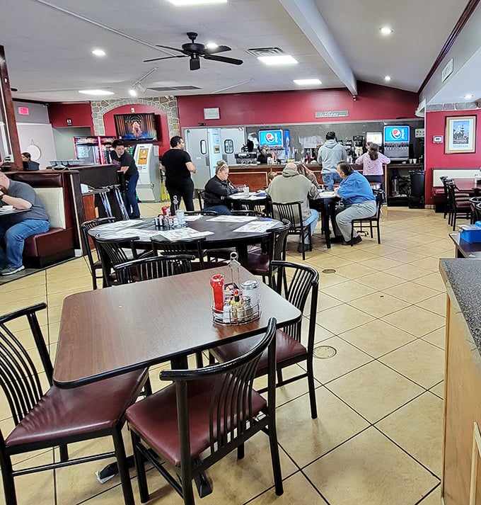 Where locals gather to debate everything from weather forecasts to football scores while waiting for their breakfast platters.