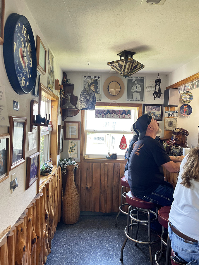 The counter seating offers front-row views of small-town America. Note the collection of memorabilia that turns waiting for your order into a treasure hunt.