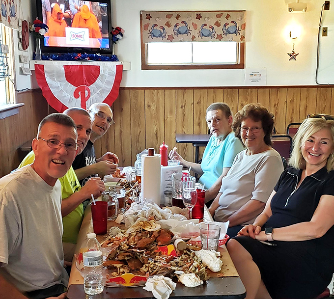 The true measure of a crab house: tables of happy people making memories over mountains of seafood and cold drinks.
