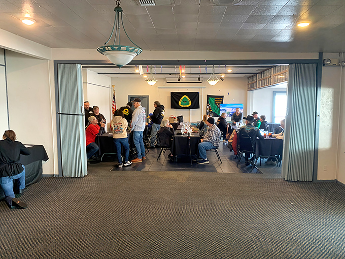 The banquet room buzzing with conversation&mdash;where strangers become temporary friends united by their mutual appreciation for good food and river views.