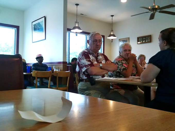 The dining room hums with the energy of regulars and newcomers alike, all united by the universal language of good food and better conversation.