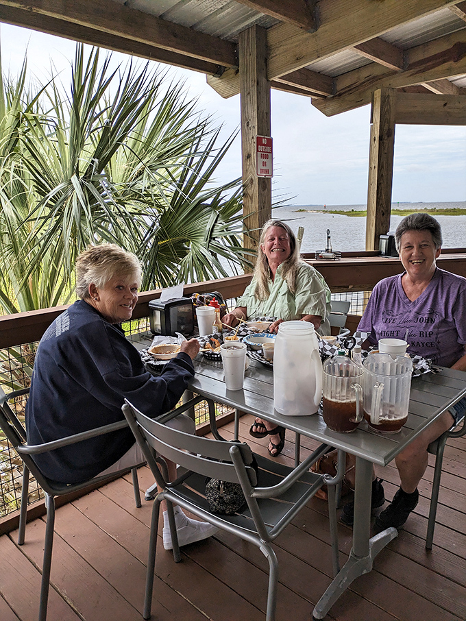 The outdoor dining area offers views of the water where your lunch likely started its journey just hours earlier.