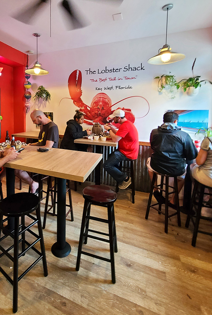 Where seafood pilgrims gather beneath the watchful eye of a giant lobster mural. The best conversations happen over great food.