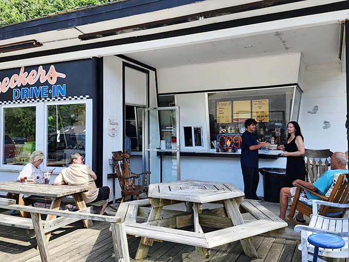 The outdoor dining area serves up fresh air and community connections alongside the famous fare. Food tastes better with a side of conversation.