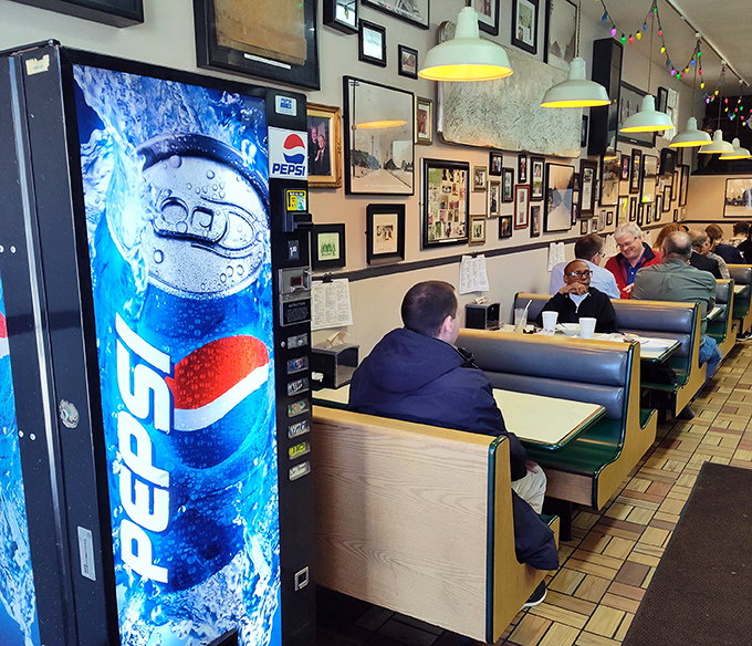 The heart of any great diner is its people. Regulars settle into their favorite booths while staff move with practiced efficiency.