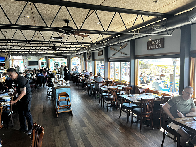 Diners bask in the glow of good food and ocean views, proving that happiness is indeed a warm chowder house.