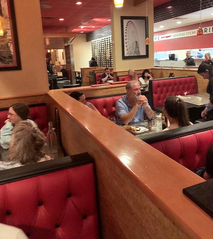 Even the dining room has that perfect medium-rare glow. Notice how everyone looks like they've just discovered the meaning of life through protein.