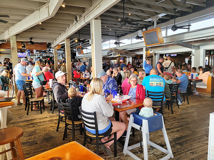 At Schooners, strangers become tablemates, families create traditions, and everyone's united by the universal language of "pass the hushpuppies, please."