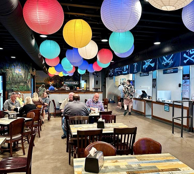 Happiness is a full dining room where strangers become comrades united by the universal language of "mmm" and "pass the napkins, please."