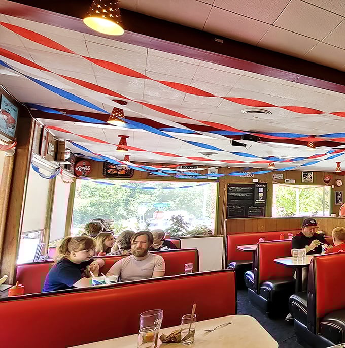 Where families gather to create memories over meals, proving that the best social network has always been a booth at your neighborhood diner.