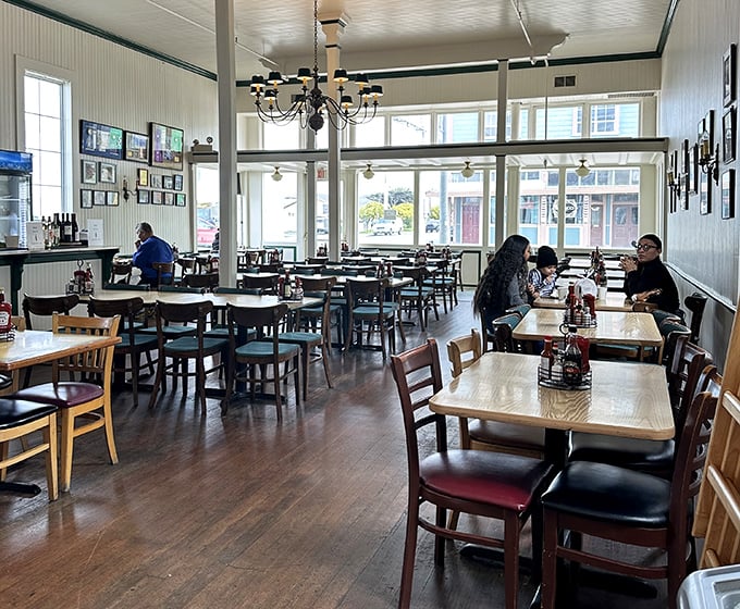 Sunlight streams through windows illuminating simple wooden tables where countless seafood love affairs have begun. No fancy tablecloths needed when the food's this good.