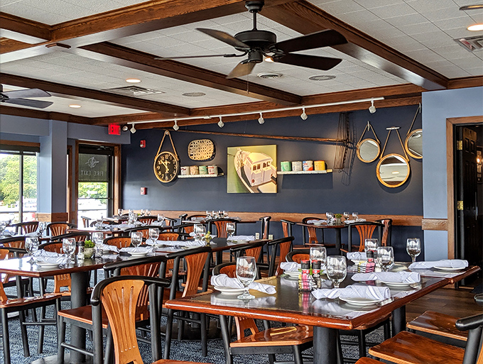 The dining room strikes that perfect balance between "special occasion" and "Tuesday night dinner." Wooden beams and nautical accents set the Eastern Shore mood.