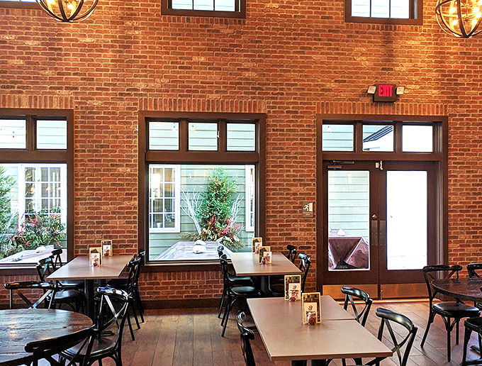 Exposed brick walls and wooden tables create that rare atmosphere&mdash;casual enough for Tuesday night, special enough for celebrations.