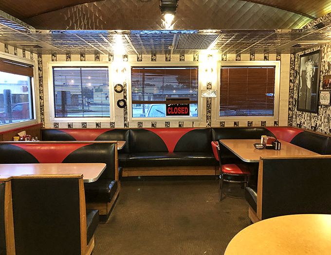 Empty booths waiting for their next story. In diners like this, every table has hosted first dates, family celebrations, and road-weary travelers finding respite.