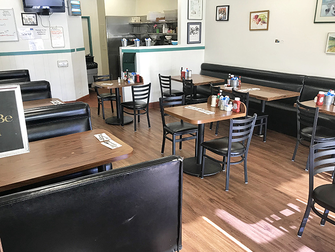 Booths that have heard a thousand conversations and teal accents that say "stay awhile."