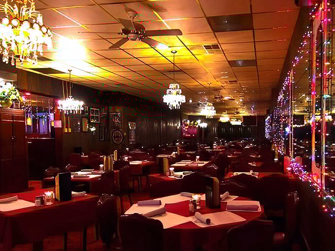 Empty tables waiting for the evening rush, chandeliers standing by. The calm before the carnivorous storm that happens nightly at this Milwaukee institution.