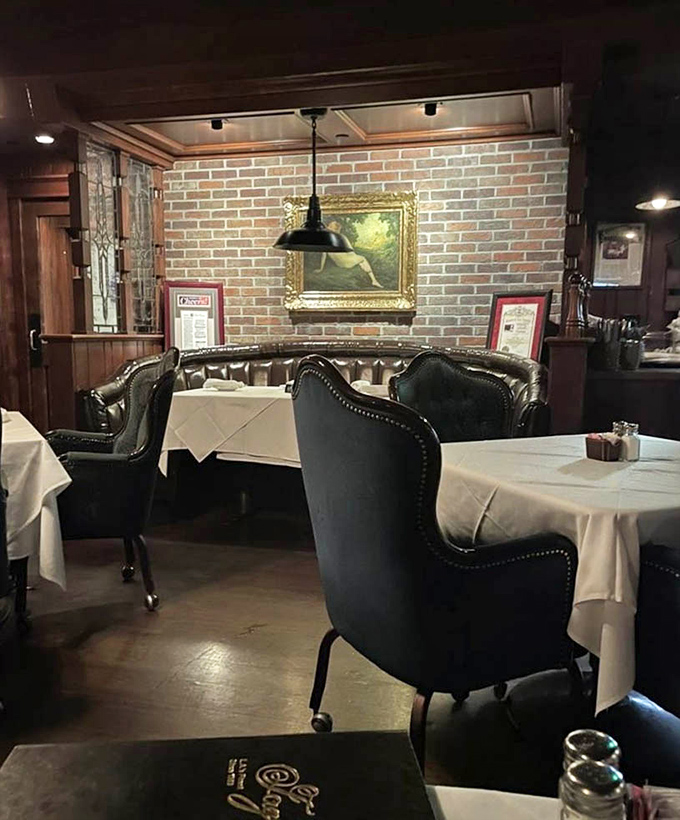 These leather chairs have cradled more Hollywood deal-making and anniversary celebrations than most therapists' couches in Beverly Hills.