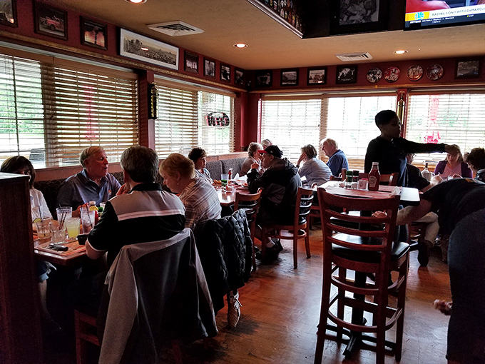 Where everybody knows your name, or at least your wing order. The dining area hums with conversation and the occasional collective gasp when the Browns score.