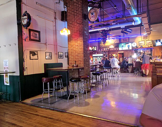 The dining room buzzes with that perfect mix of sports bar energy and family restaurant comfort.