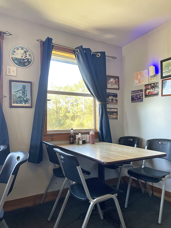 A cozy corner table with views of Florida pines &ndash; where racing drivers on the wall watch over your seafood feast with approval.