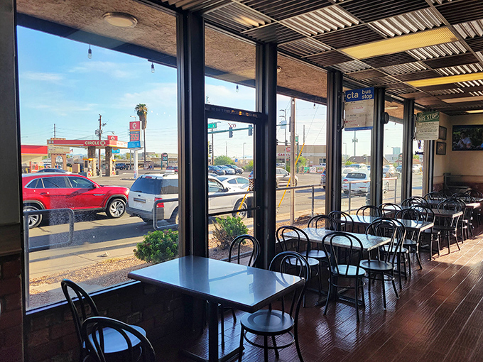 Sun streams through windows into a no-frills dining area where the focus remains squarely on what matters most &ndash; the food.